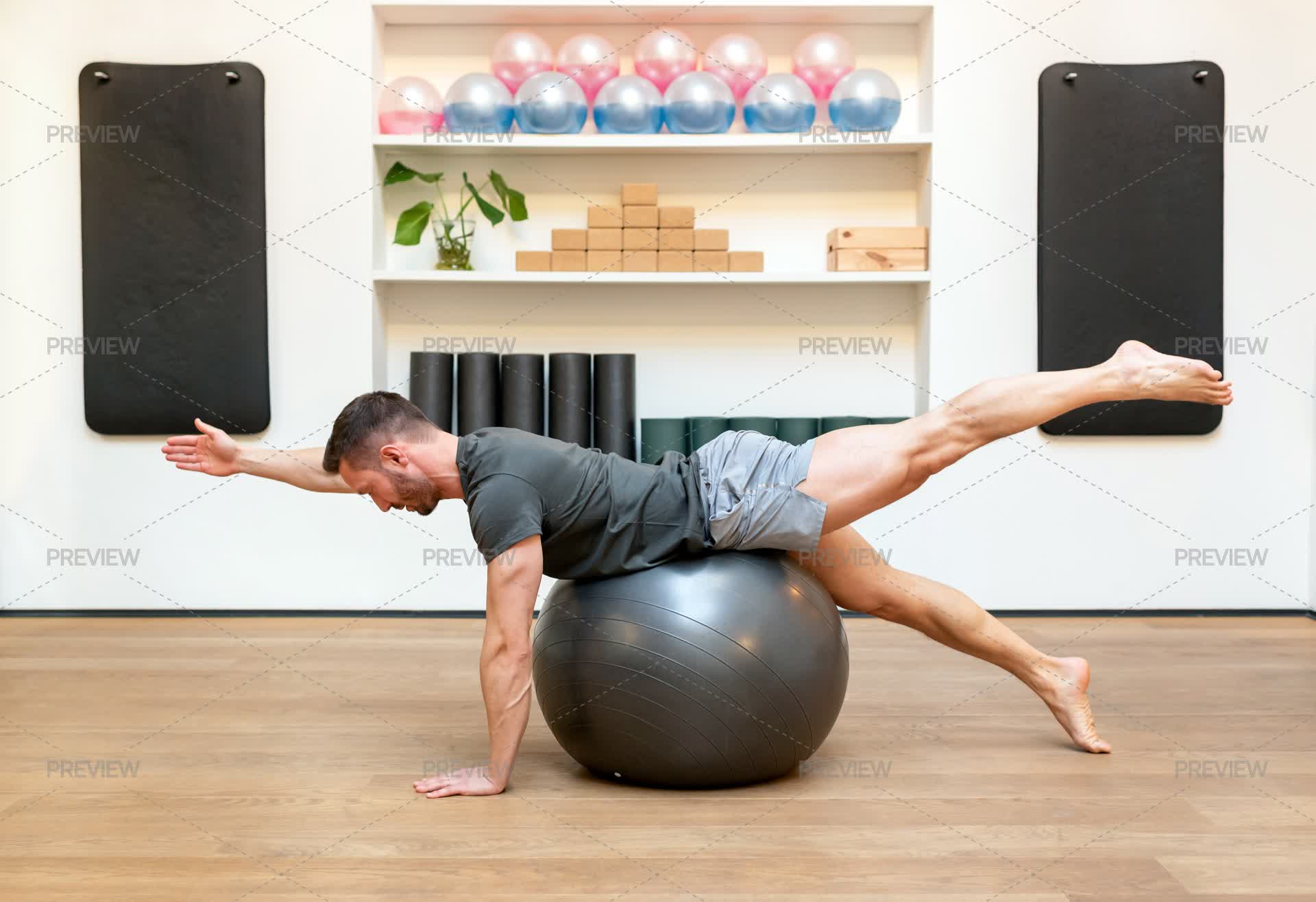 Man Doing Stabilization Exercise - Stock Photos | Motion Array Man Doing Stabilization Exercise - Stock Photos | Motion Array