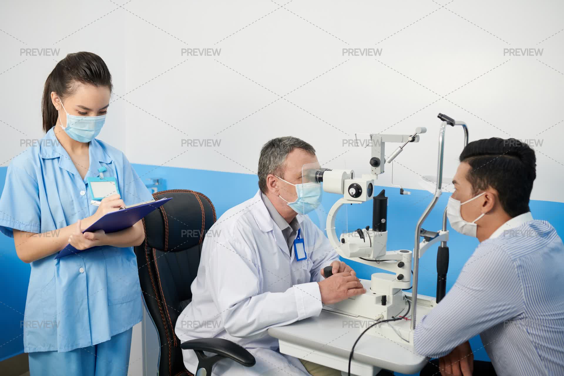 Doctor Checking IOP Of Patient - Stock Photos | Motion Array Doctor Checking IOP Of Patient - Stock Photos | Motion Array