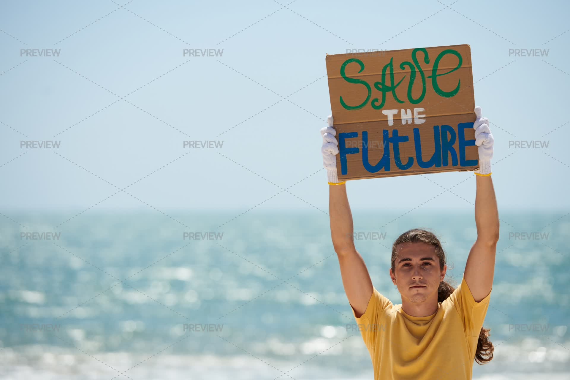 Activist Showing Save The Future Poster - Stock Photos | Motion Array Activist Showing Save The Future Poster - Stock Photos | Motion Array