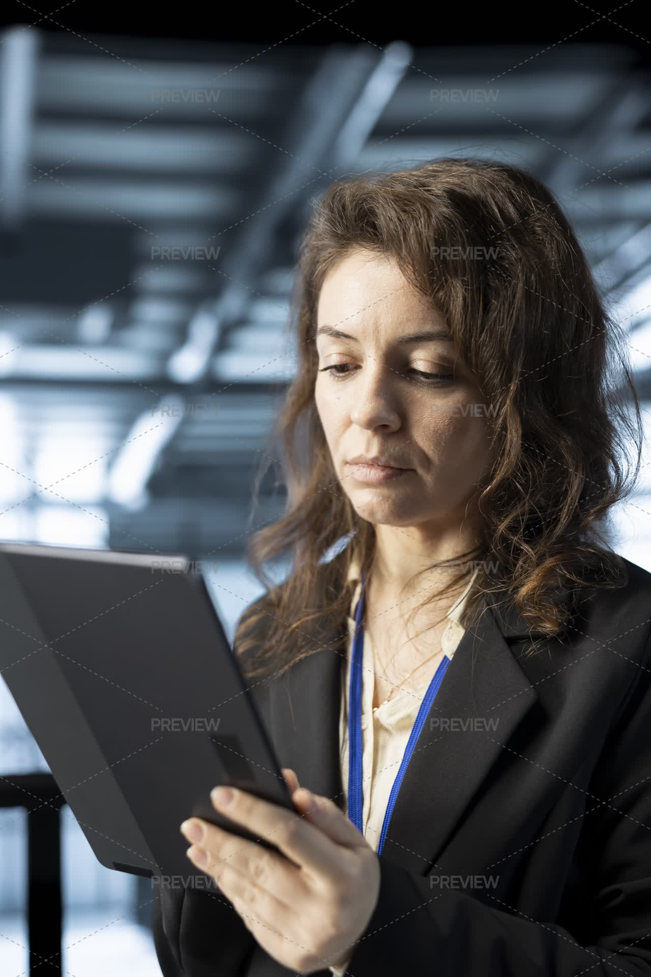 Technician In Data Center Workspace Using Tablet To Configure Network ... Technician In Data Center Workspace Using Tablet To Configure Network ...